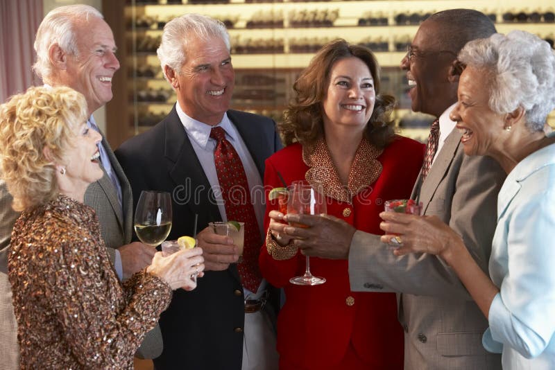 Friends Socializing at a Bar Stock Photo - Image of restaurant ...