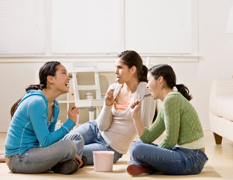 Friends Socializing and Eating Ice Cream Stock Image - Image of eating ...