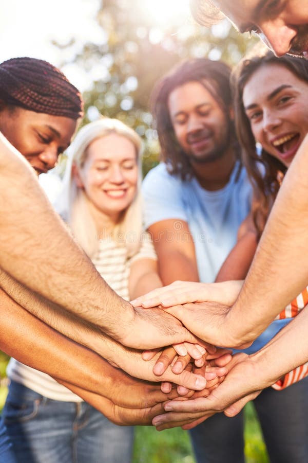 Friends Stack Hands As a Symbol of Community Stock Photo - Image of ...