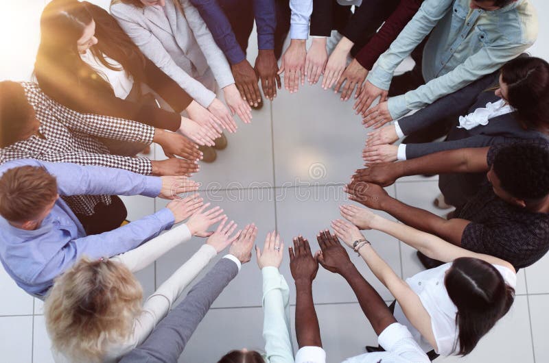 Friends with Stack of Hands Showing Unity and Teamwork. Stock Photo ...