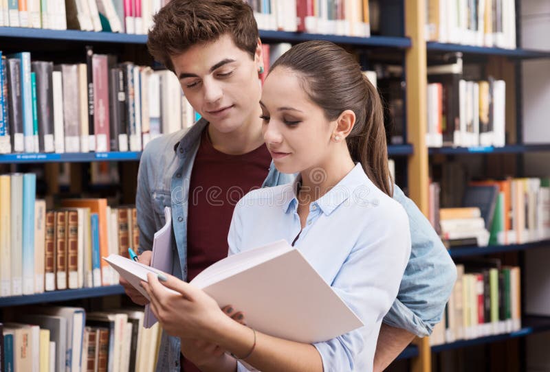 Friends studying together stock photo. Image of desk - 49887434