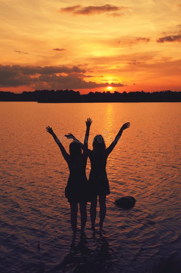 Friends at sunset stock image. Image of healthy, ecstatic - 45119985