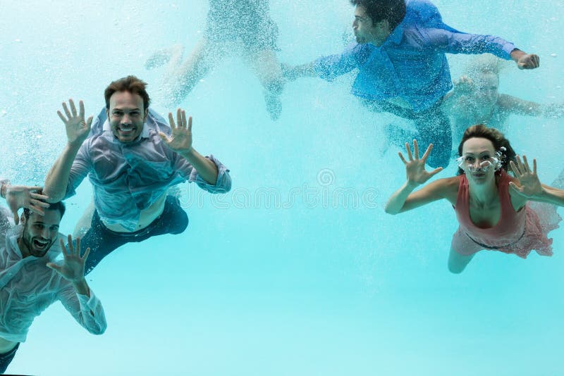 Friends swimming in pool stock photo. Image of friendship - 68197902