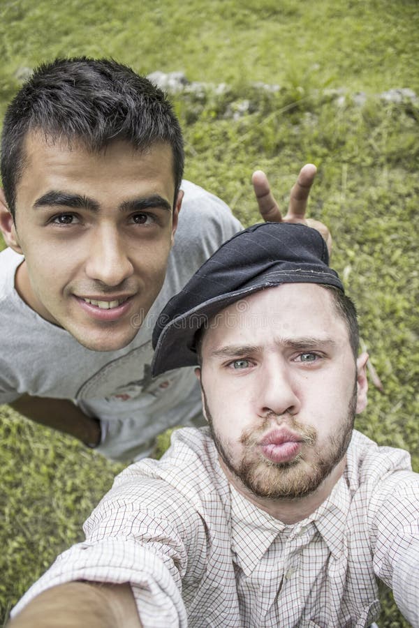 Friends Taking a Self Portrait Stock Image - Image of people, hold ...