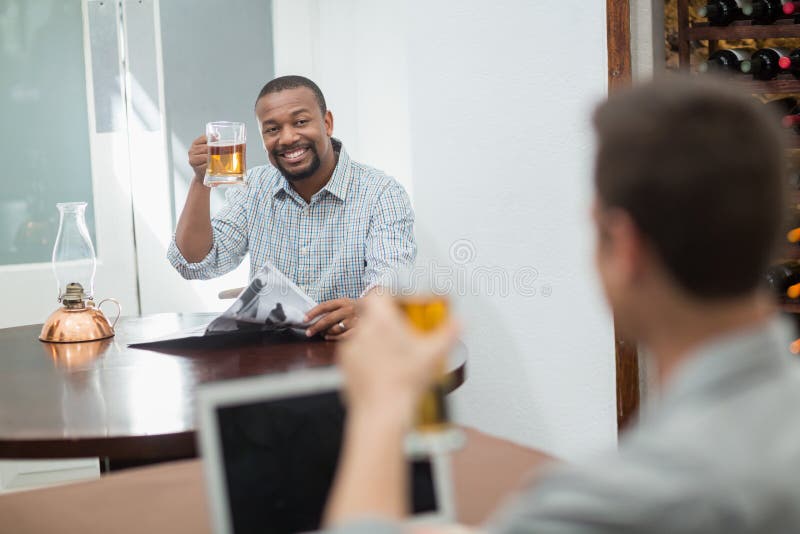 Friends Toasting Beer Glasses Stock Photo - Image of joyful, caucasian ...