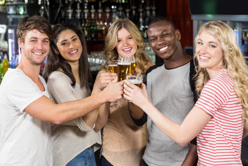 Friends toasting with beer stock photo. Image of cocktail - 68301354