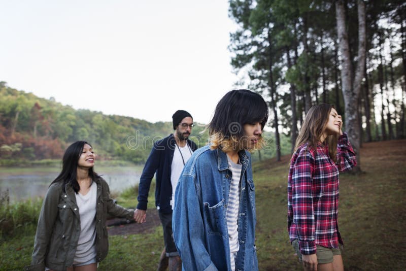 Friends Traveling Together in the Forest Stock Image - Image of friends ...