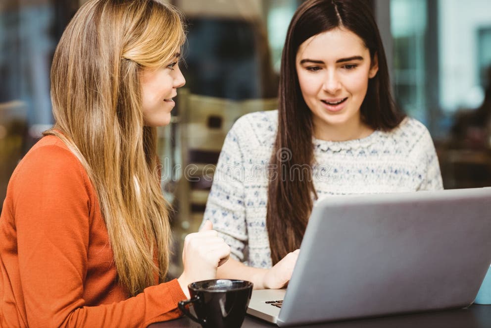 Friends Using Laptop Together Stock Image - Image of house ...