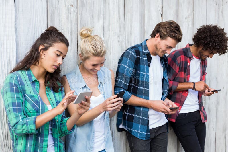Three Young Beautiful Women Using Mobile Phone at Cafe Shop. Stock ...