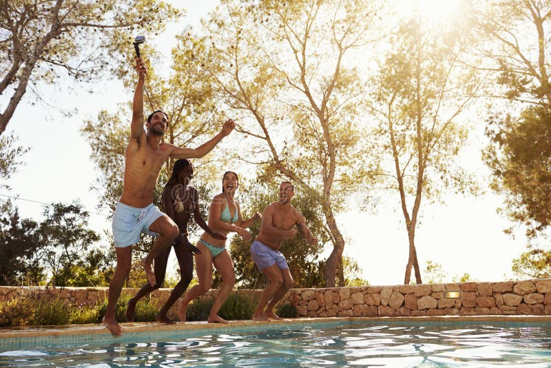 Friends on Vacation Taking Selfie of Jumping into Pool Stock Image ...