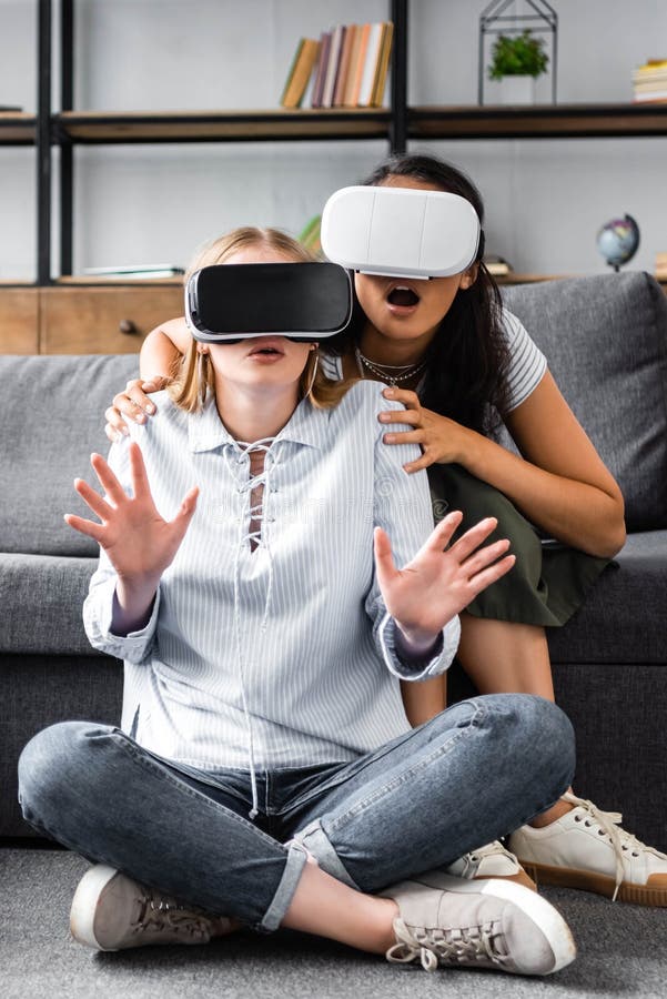 Friends with Virtual Reality Headsets Sitting on Floor Stock Image ...