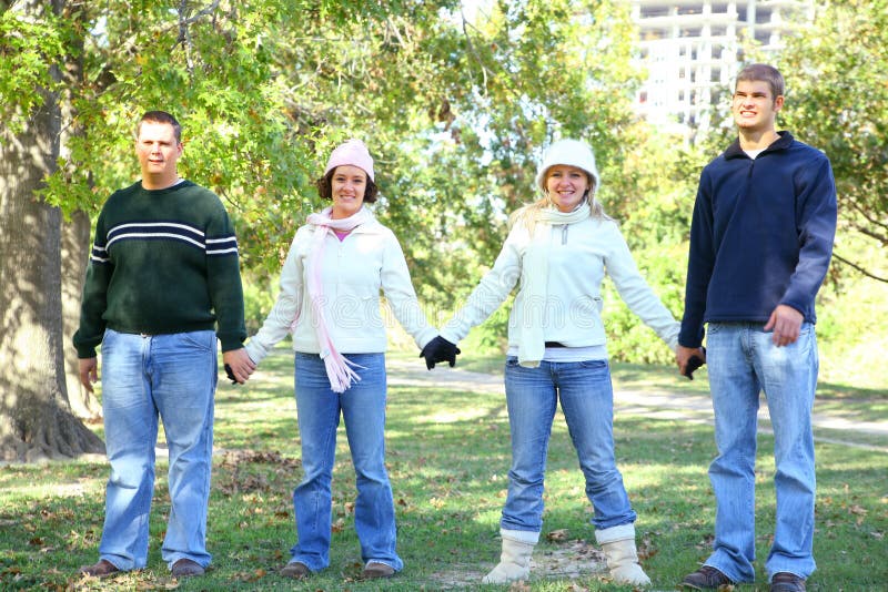 Friends Walking in Park stock photo. Image of lifestyle - 7710566