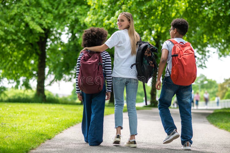 Friends Walking in the Park and Feeling Contented Stock Image - Image ...