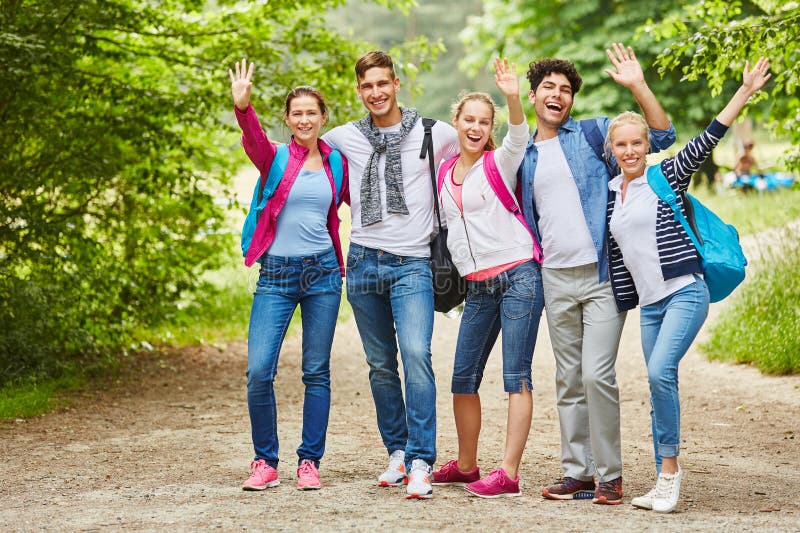 Friends waving and smiling stock image. Image of hands - 95575137