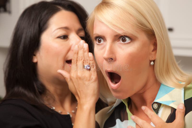 Friends Whispering Secrets stock image. Image of eyes - 9769939