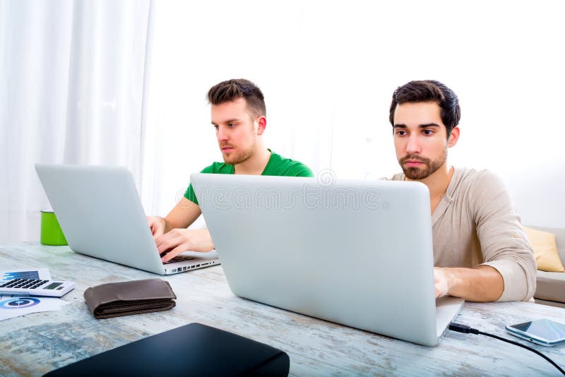 Friends working together stock photo. Image of casual - 77912010