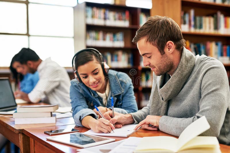 Friends, Writing or Students Reading Books in Library for Education ...