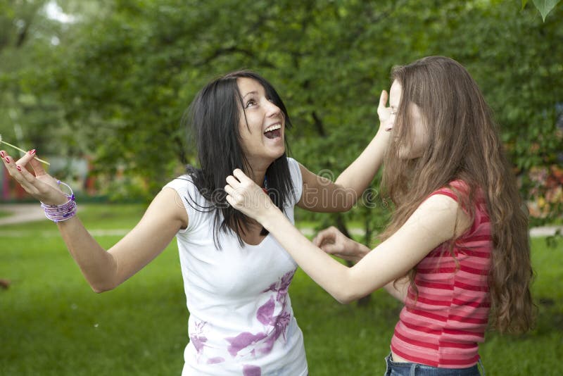 Two bikini girls fighting stock image. Image of expression - 1911335