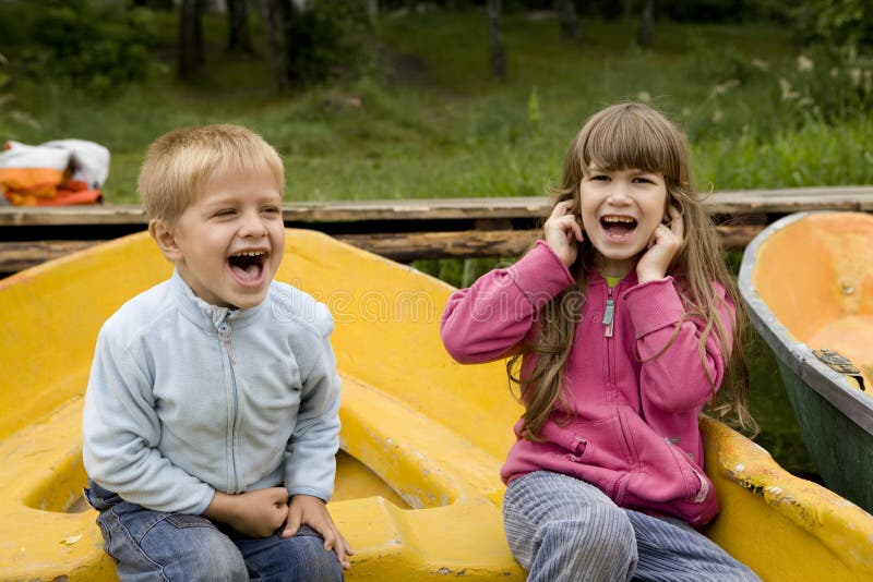 Friendship. Kids Playing in Boat Stock Photo - Image of camping, boat ...