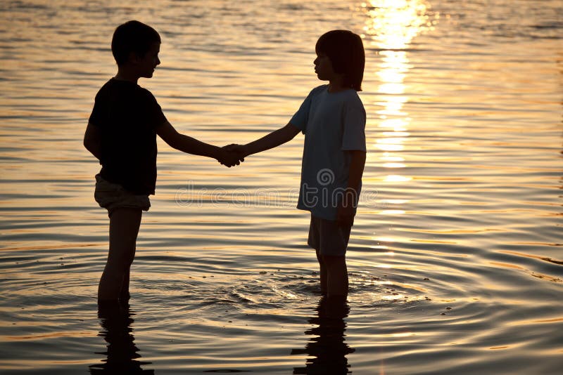 Friendship pact stock photo. Image of boys, wather, sunset - 20138634