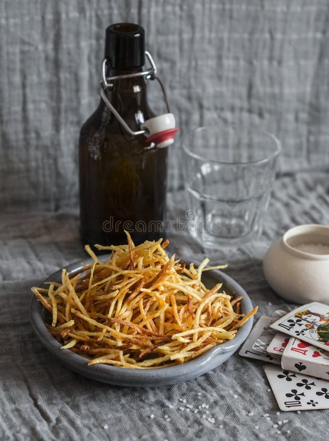 Fries and bottle of beer stock photo. Image of dish, background - 85395488