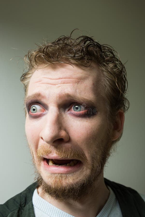 Frightened Man with Red Painted Eyes. Stock Photo - Image of sleepy ...