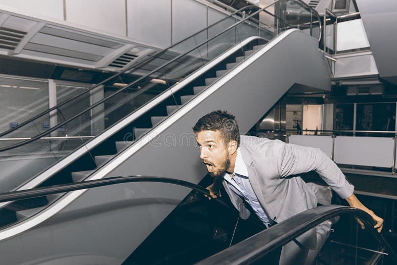 Frightened Man Run Away. Stressed Businessman. Scared Man Stock Photo ...