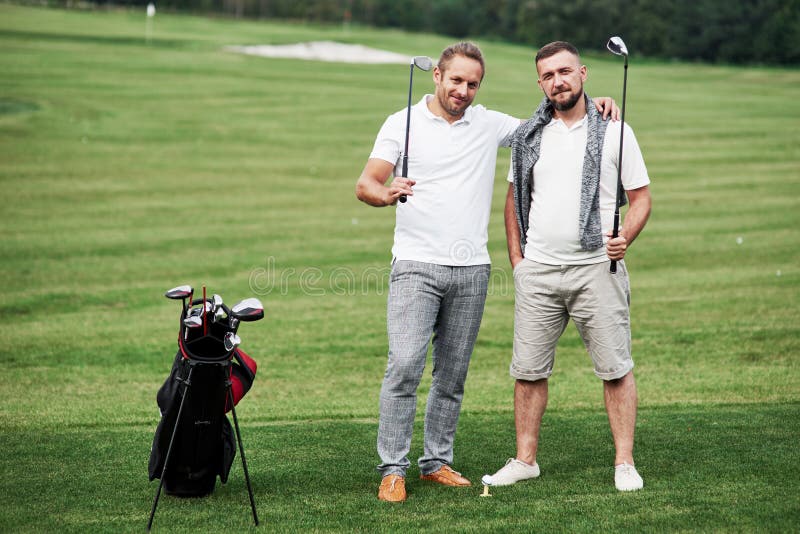 Frinendship between Two Golfers Standing on Beautiful Green Lawn Stock ...