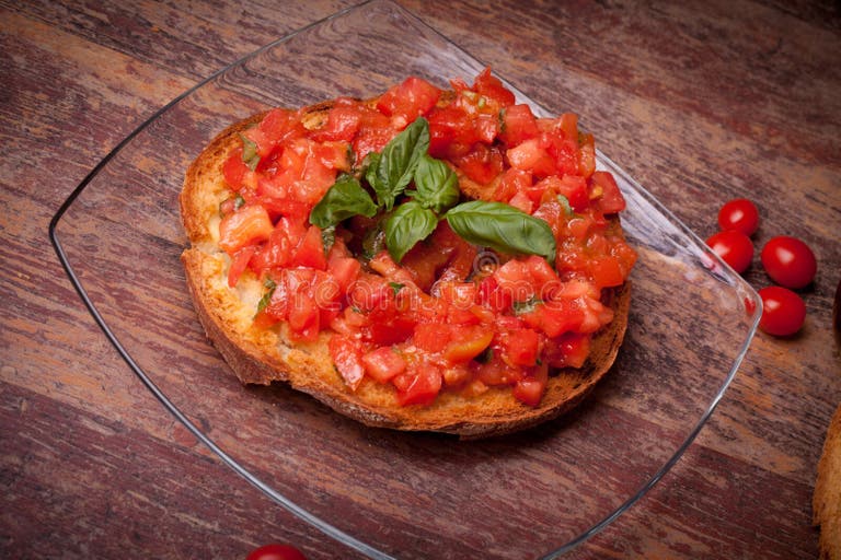 Frisella with Tomatoes and Basil Stock Photo - Image of crostini ...