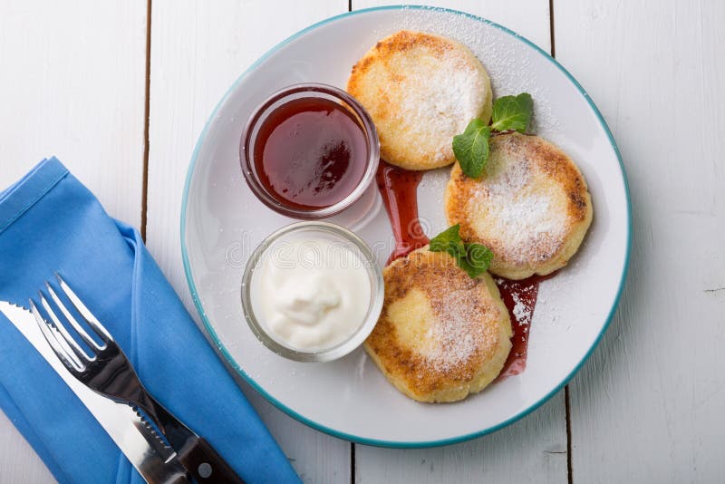 Fritters Served with Jam and Cream for Breakfast Stock Photo - Image of ...