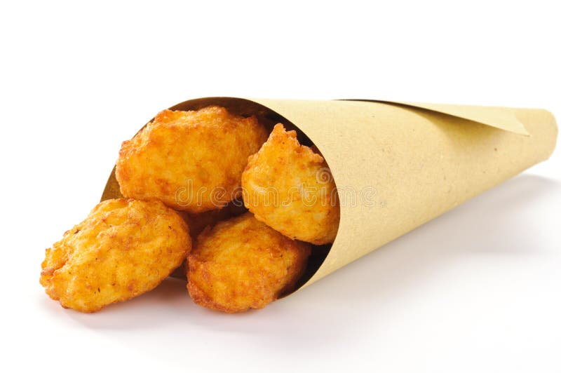 Fritters in yellow paper stock image. Image of carnival - 22899331