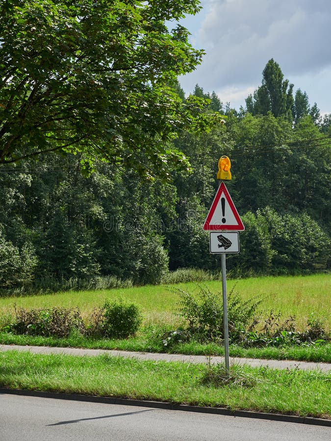 A frog warning sign stock photo. Image of environment - 232300090