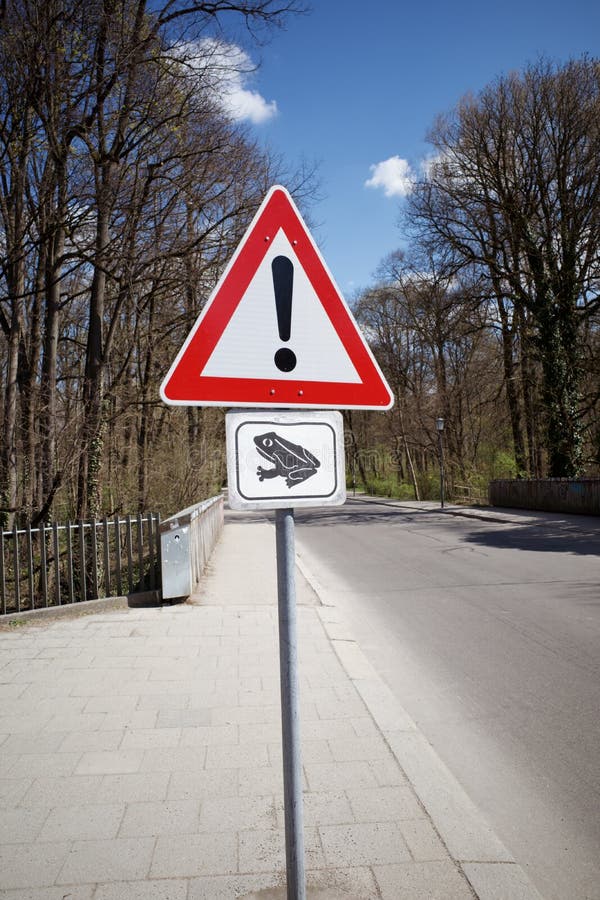 Frog warning sign stock photo. Image of germany, warning - 215210570