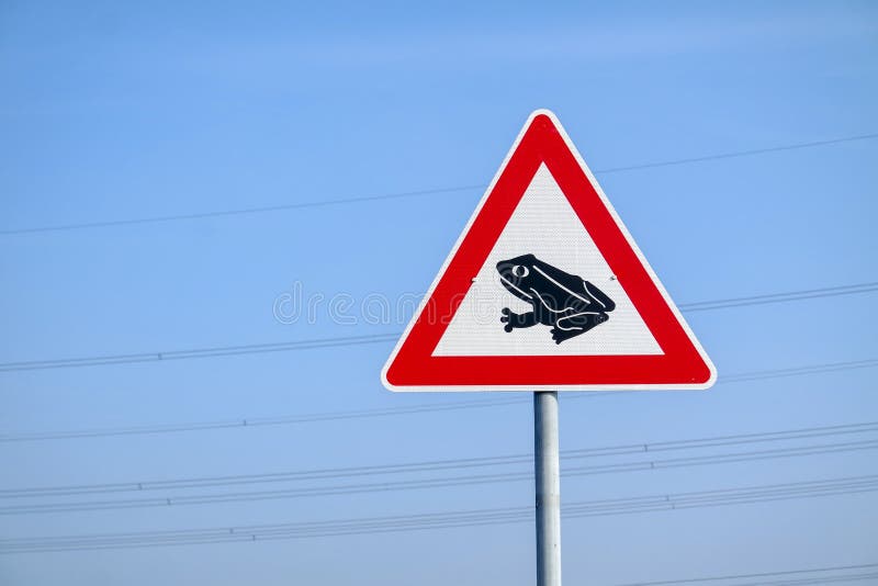 Frogs Crossing the Road Warning Sign Stock Image - Image of danger ...