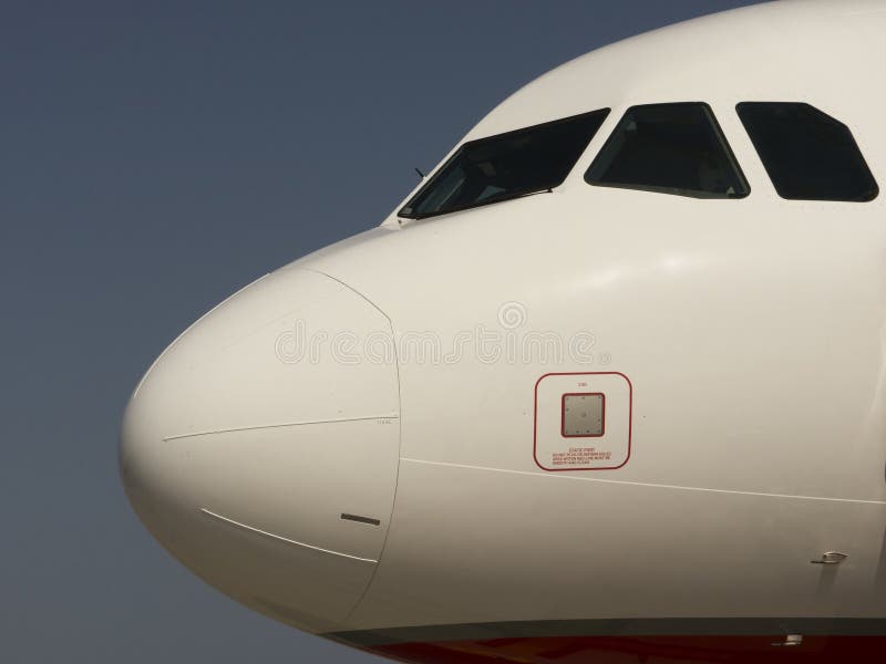 Front of an airplane stock photo. Image of windows, pane - 21553552