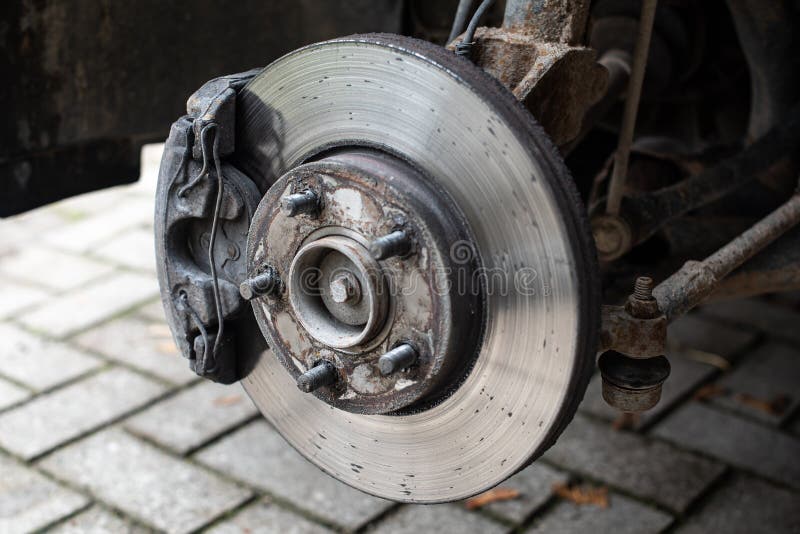 Front Assembly of Ventilated Disc Brake and Wheel Hub on an Used Car ...