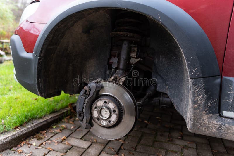 Front Assembly of Ventilated Disc Brake and Wheel Hub on an Used Car ...