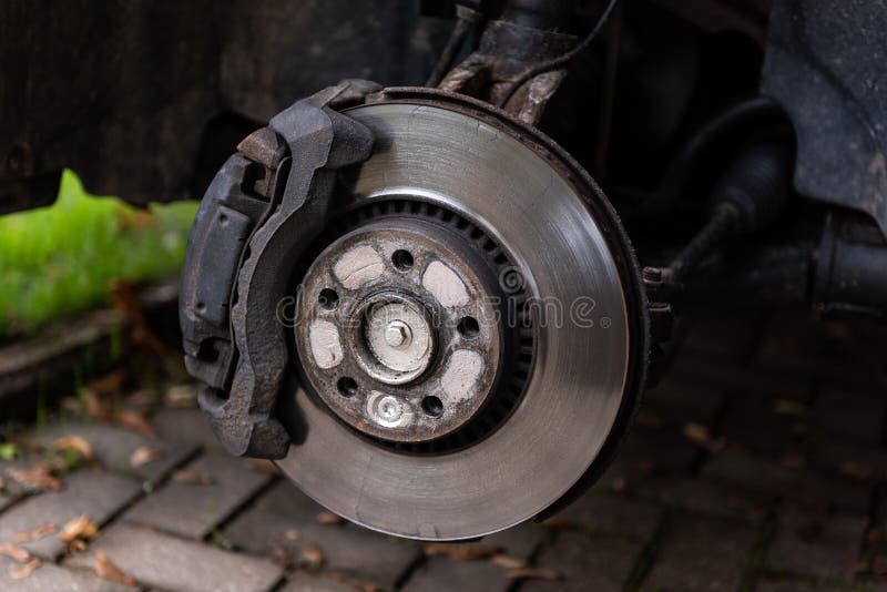 Front Assembly of Ventilated Disc Brake and Wheel Hub on an Used Car ...