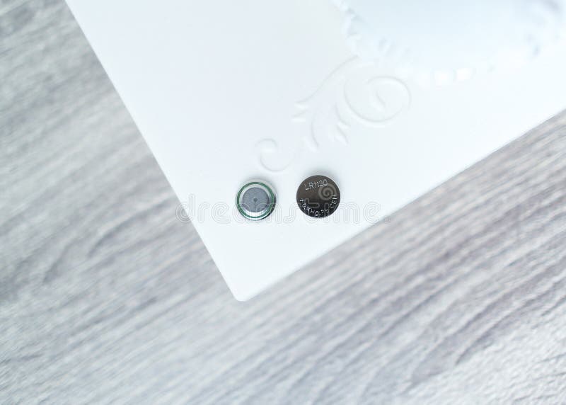 LR1130 Coin or Button Cell Battery Stock Photo - Image of desk ...