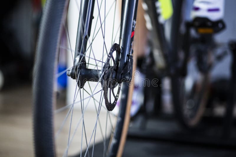 Front Bicycle Wheel with Disk Brake on an Indoor Scene Stock Photo ...