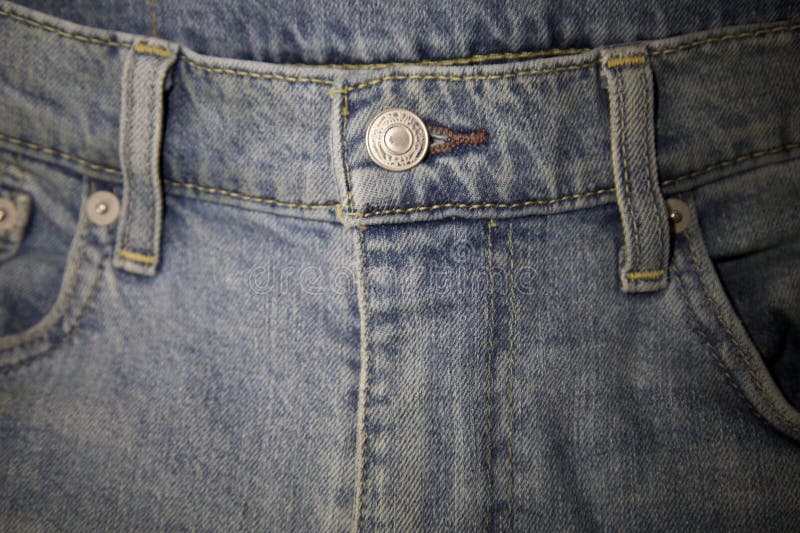 Front of Blue Jeans with Button and Belt Loops Stock Photo - Image of ...
