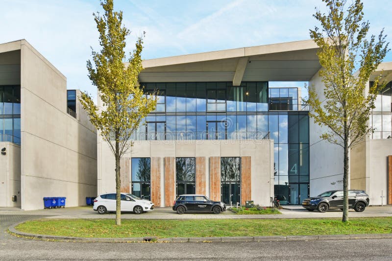 The Front of a Building with Cars Parked Outside Editorial Image ...