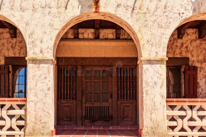 The Front of a Building with a Large Archway Stock Image - Image of ...