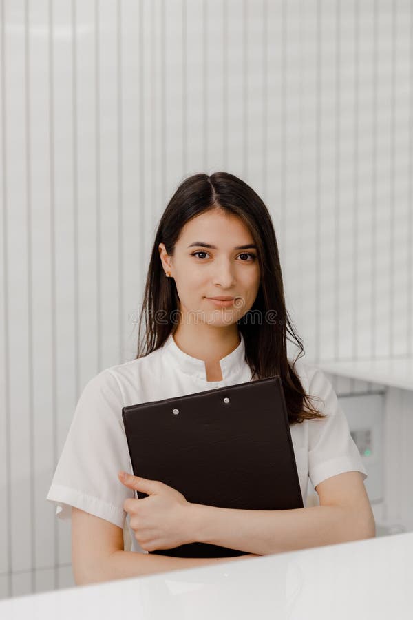 In Front of the Camera Beautiful Medical Assistant Posing To the Camera ...