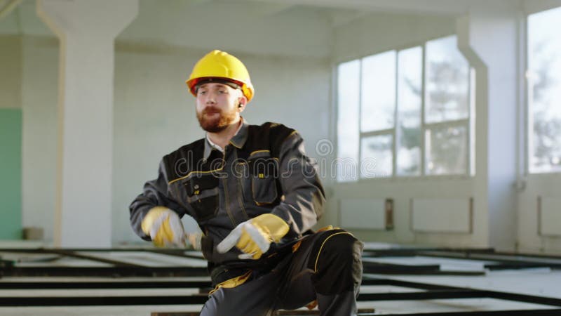 In Front of the Camera Charismatic Dancing Constructor Worker Man with ...