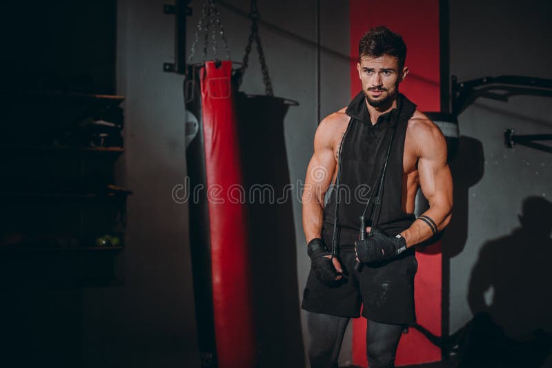 In Front of the Camera Charismatic Guy with a Brutal Face after His ...