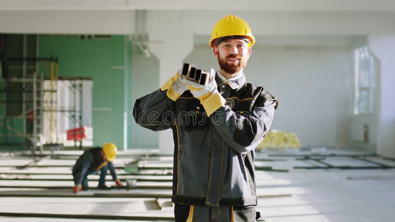 In Front of the Camera Good Looking Man Construction Worker Working ...