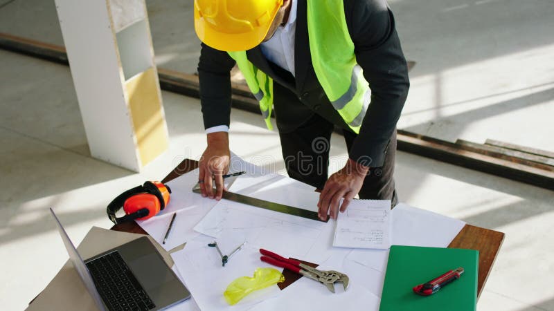 In Front of the Camera Taking Video of a Man Architect Analysing and ...