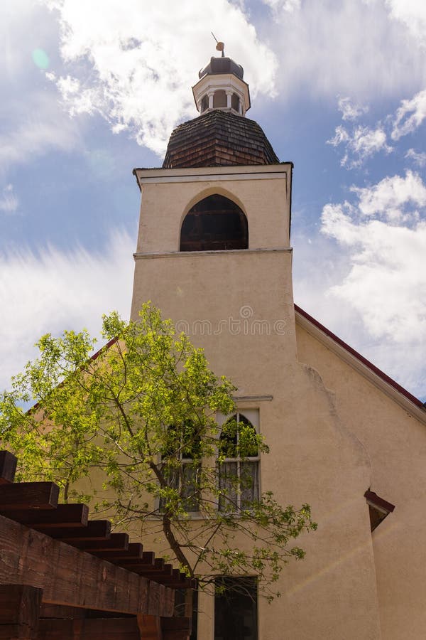 Front of Church with Bell Tower and Tree Stock Photo - Image of ...