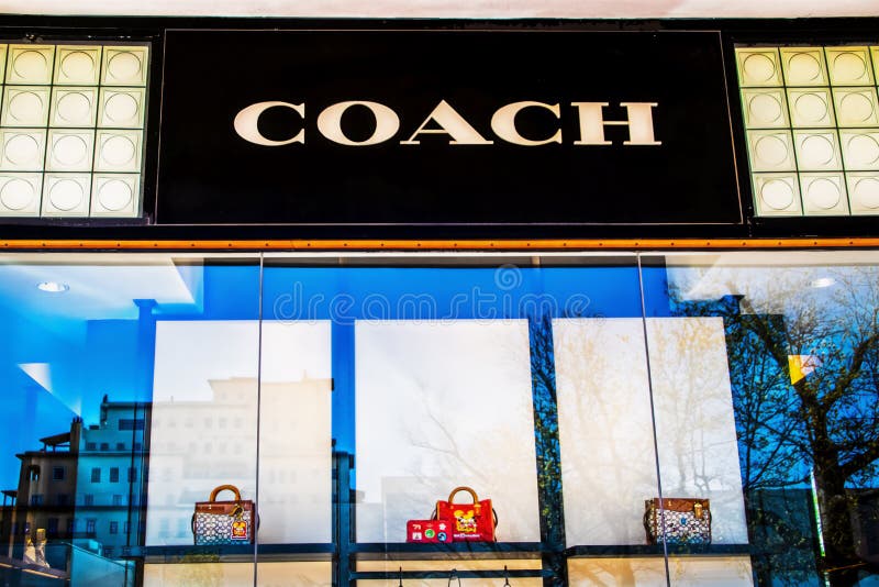 Front of Coach Store with Mickey Mouse Items Featured in Display Window ...